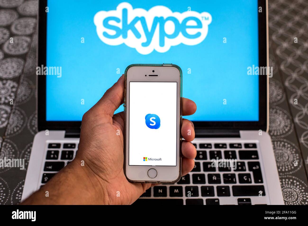 In this photo illustration a Skype app seen displayed on a smartphone ...