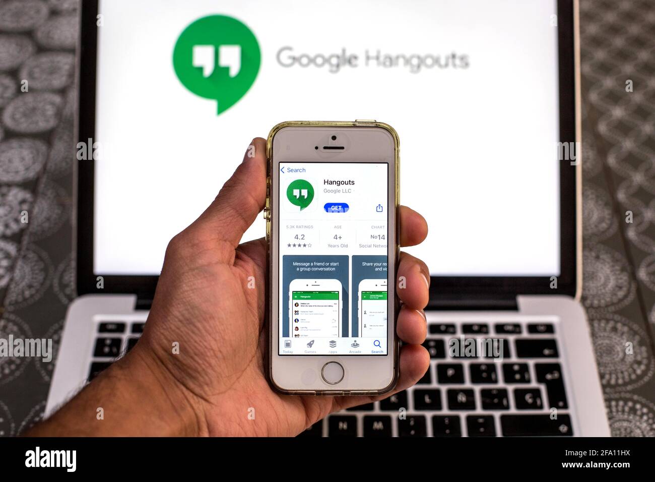 In this photo illustration a Google Hangouts app in App Store seen displayed on a smartphone ...