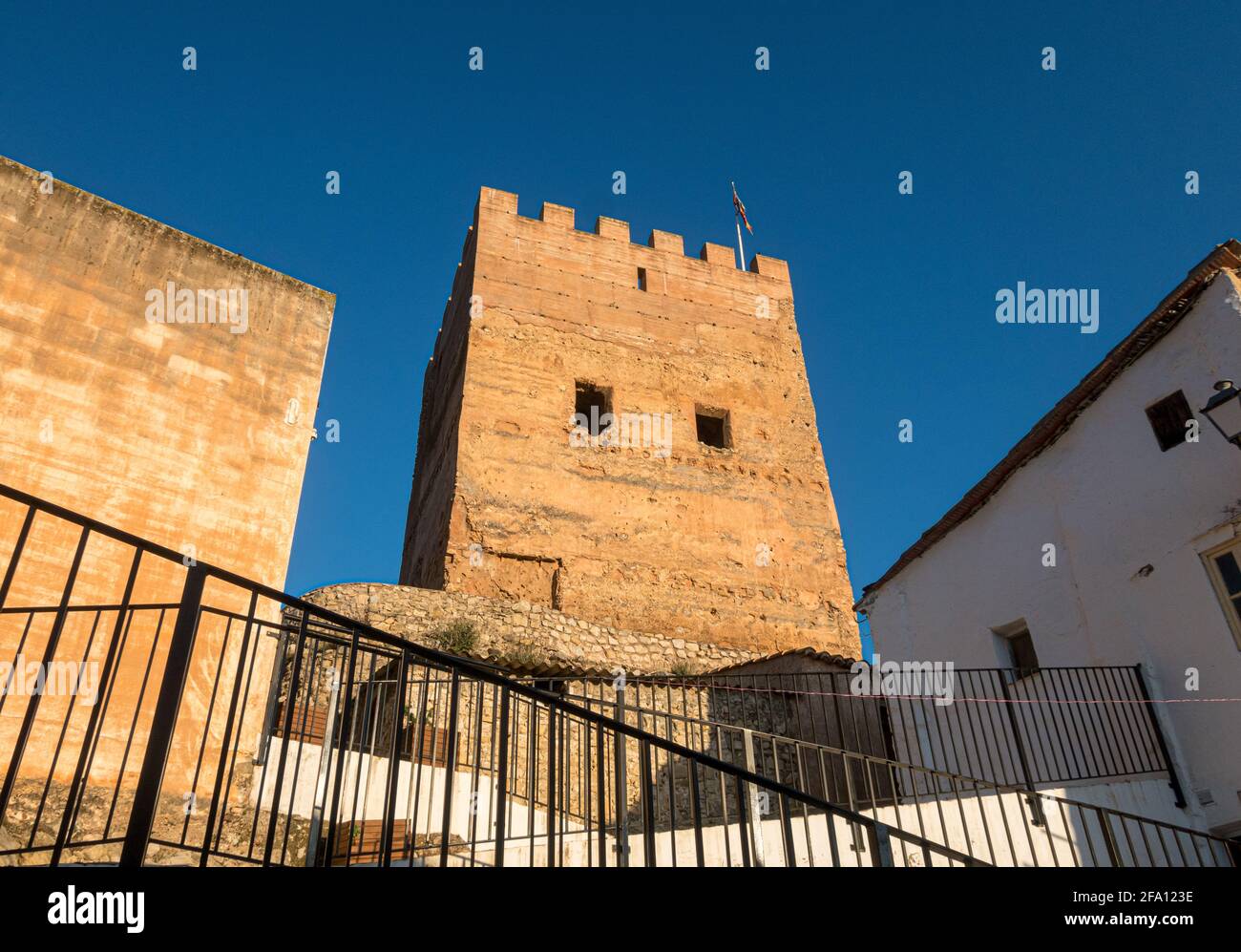 Low angle shot of the Sot de Chera castle under a beautiful cloudless ...