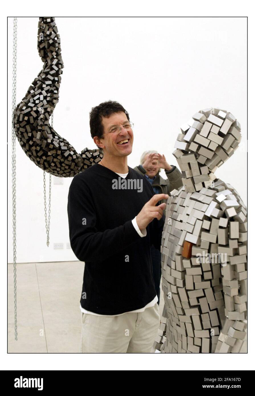 Anthony Gormley in his studio in north London......with Hugh Brody who ...