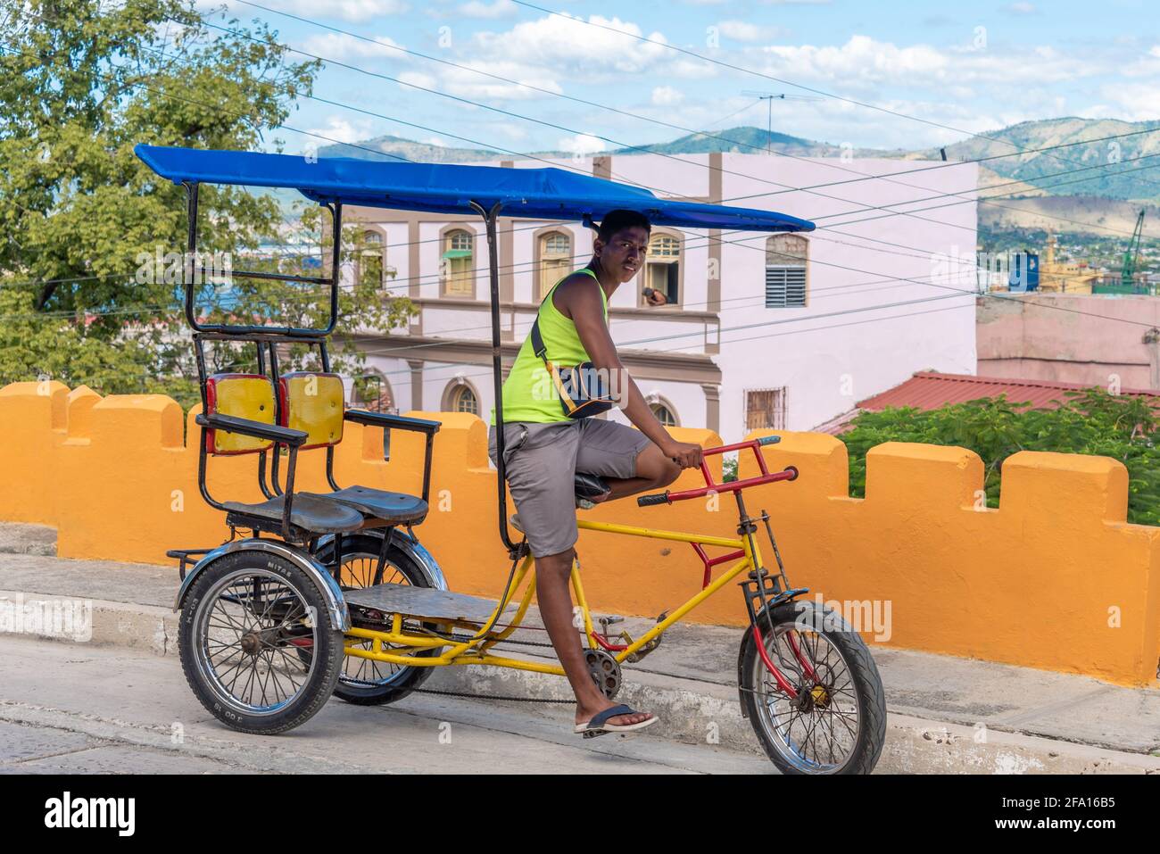Cuban man in bicitaxi or pedicab, Santiago de Cuba, Cuba Stock Photo ...