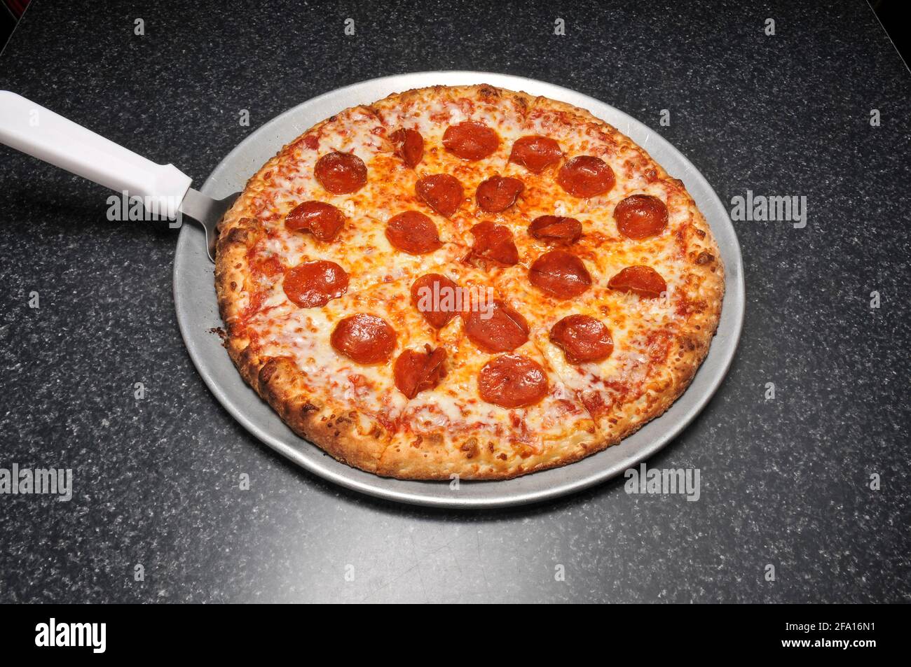 Delicious tomato sauce cheese covered hot and tasty pepperoni pizza pie ...