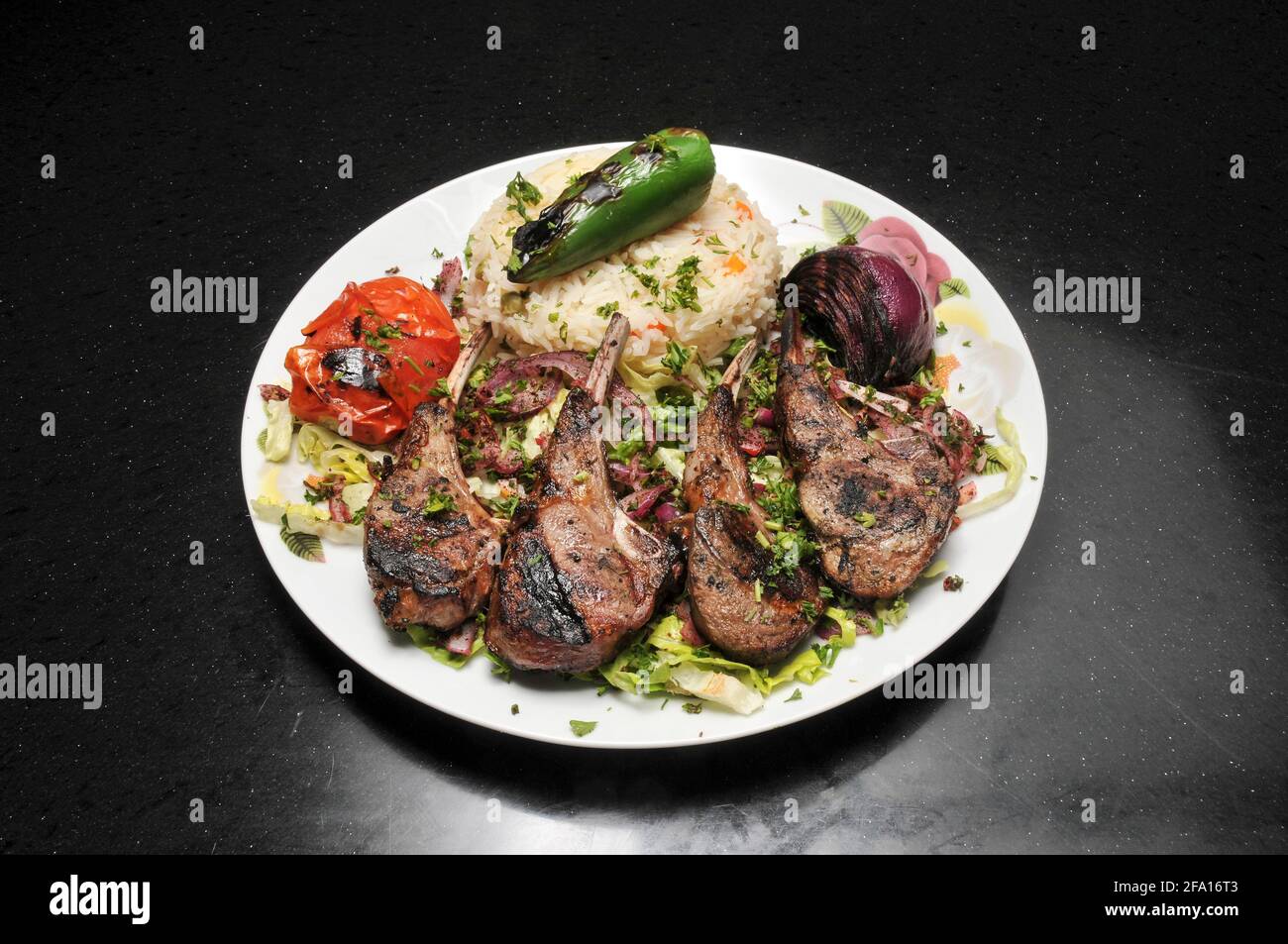 Delicious and traditional dish known as lamb chops Stock Photo - Alamy