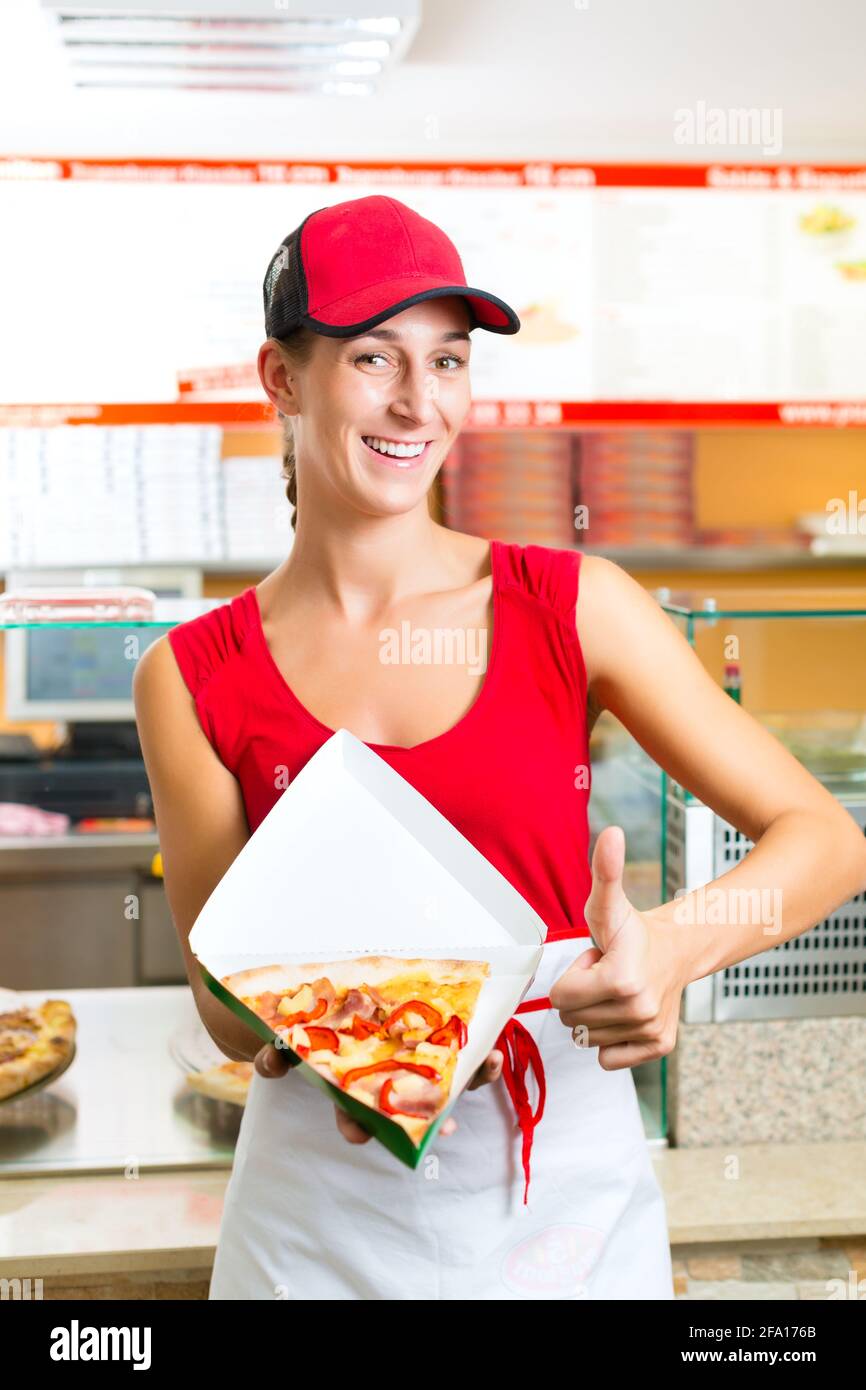 Woman delivering pizza to a man hi-res stock photography and images - Alamy