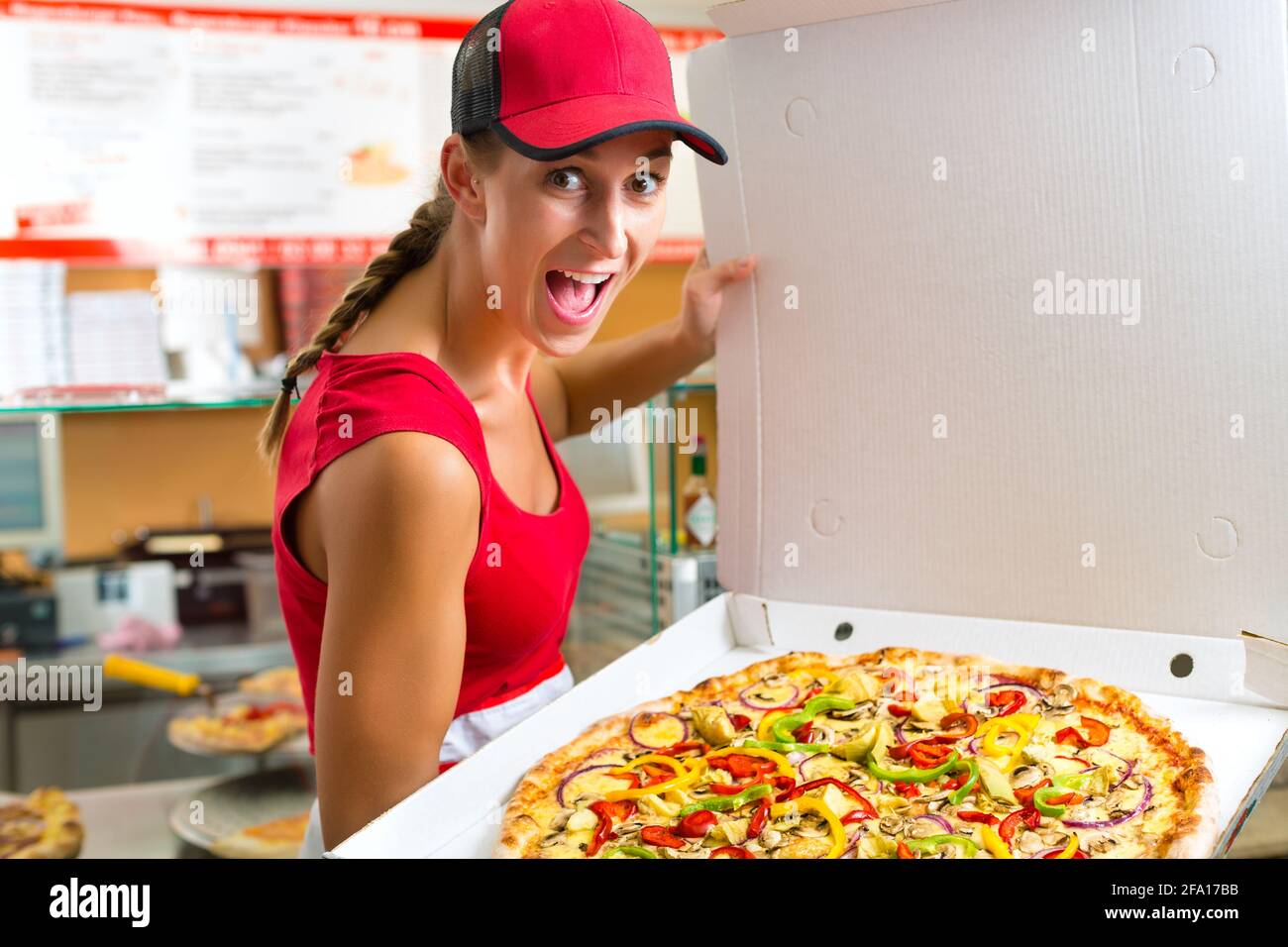 Ordering a pizza hi-res stock photography and images - Alamy