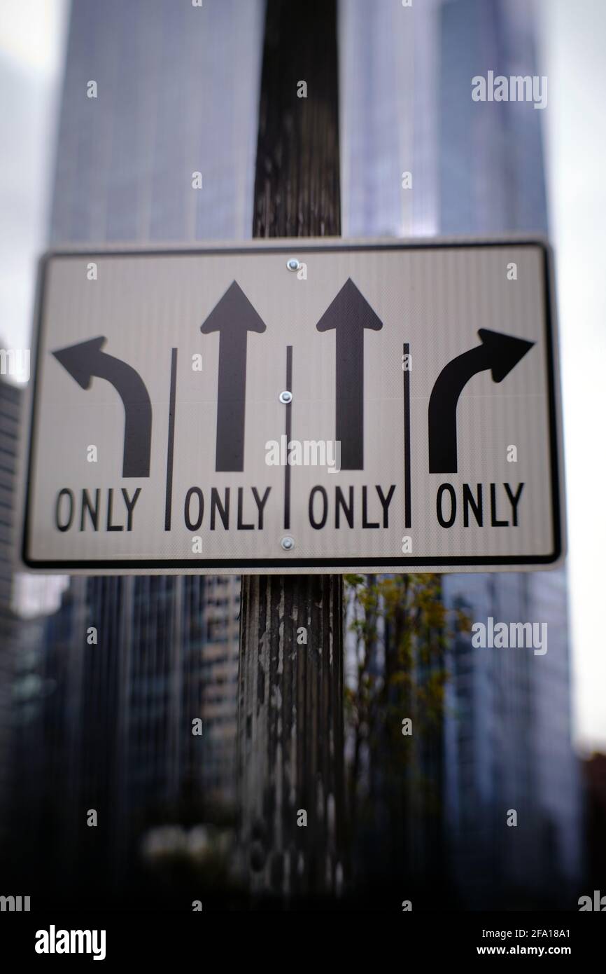Lensbaby image looking up at sign with background of Chicago skyscraper ...