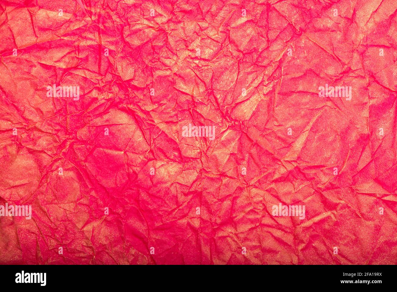 Pink crumpled paper texture or background Stock Photo - Alamy