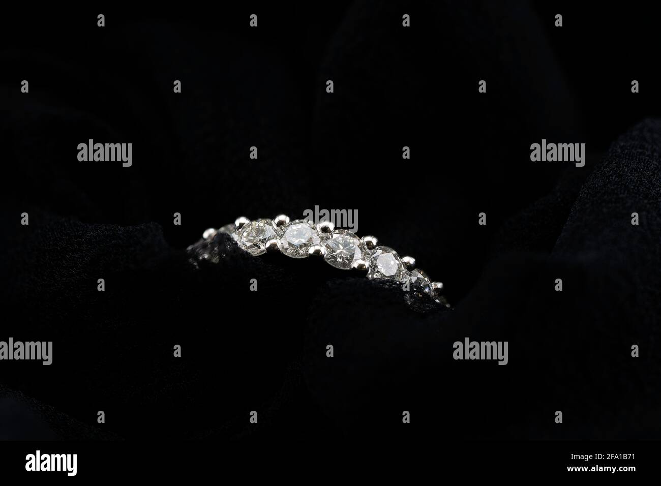 A diamond eternity ring, also known as an infinity ring, symbolizing ...