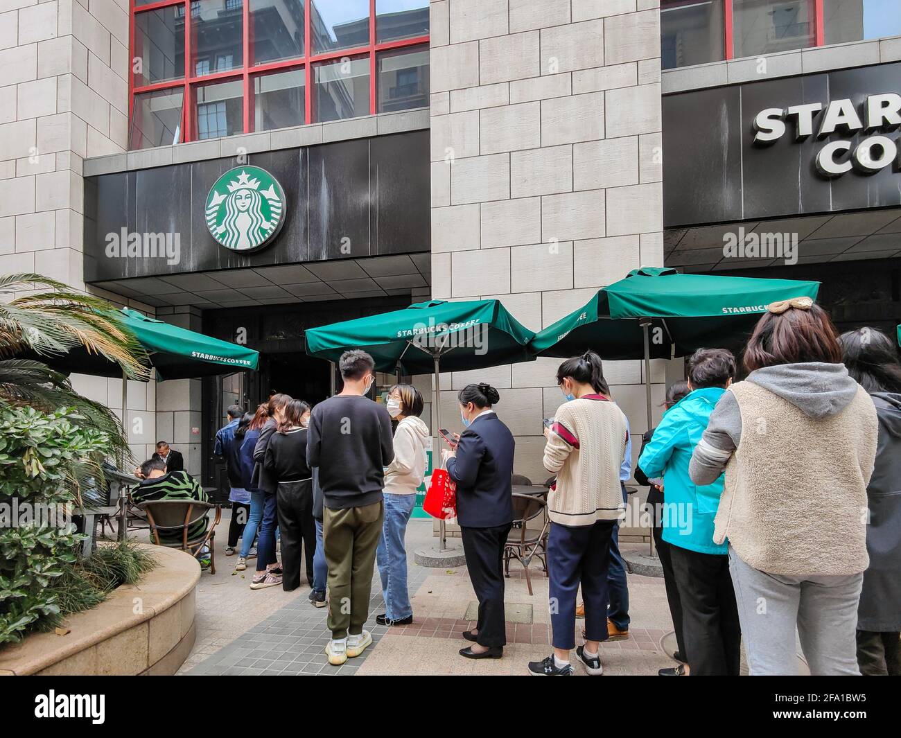 SHANGHAI, CHINA - APRIL 22, 2021 - Many customers line up outside ...