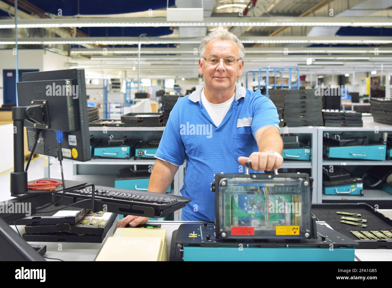 production of electronic components in a modern factory - engineer at ...