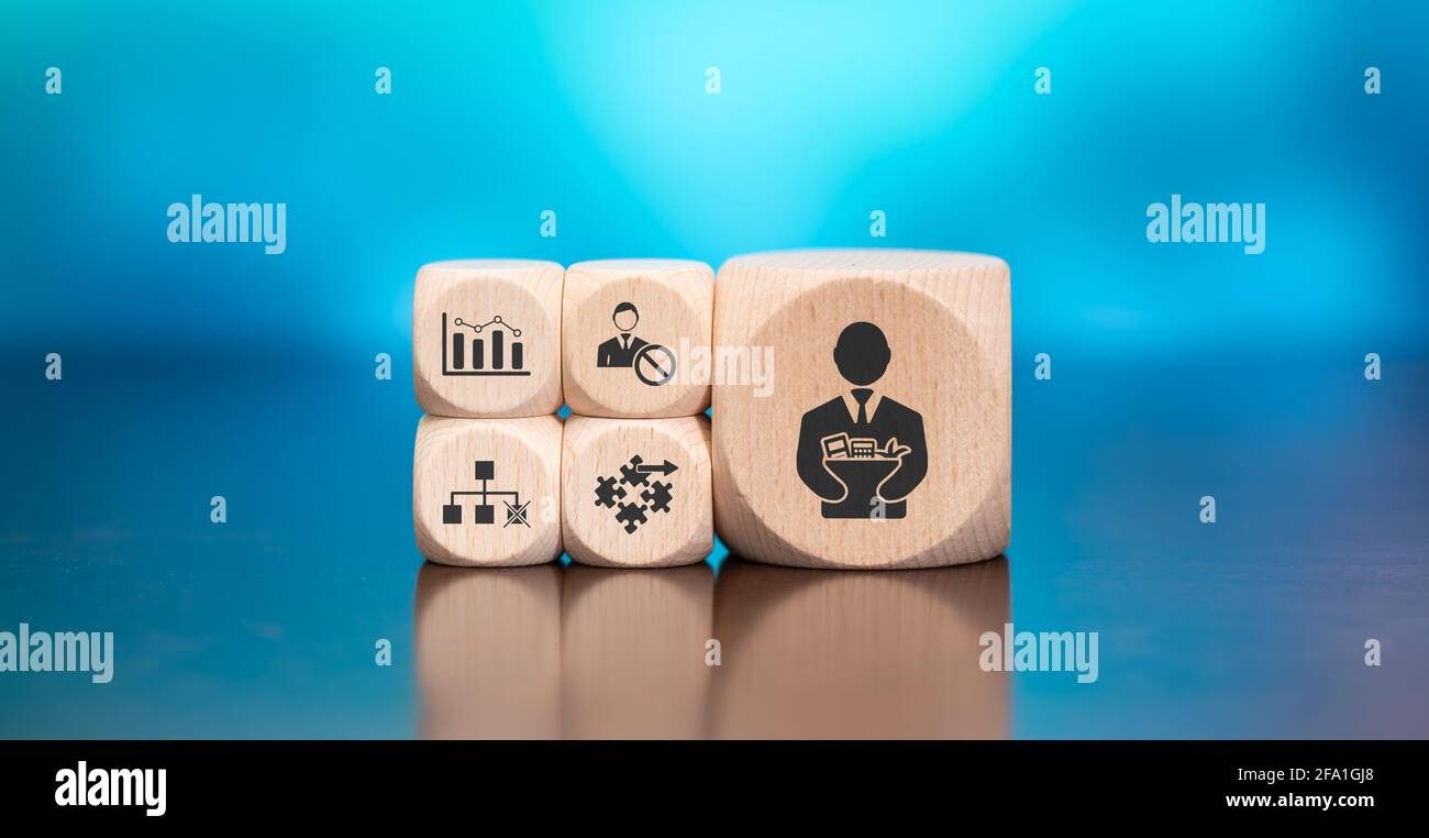 Wooden blocks with symbol of job loss concept on blue background Stock ...