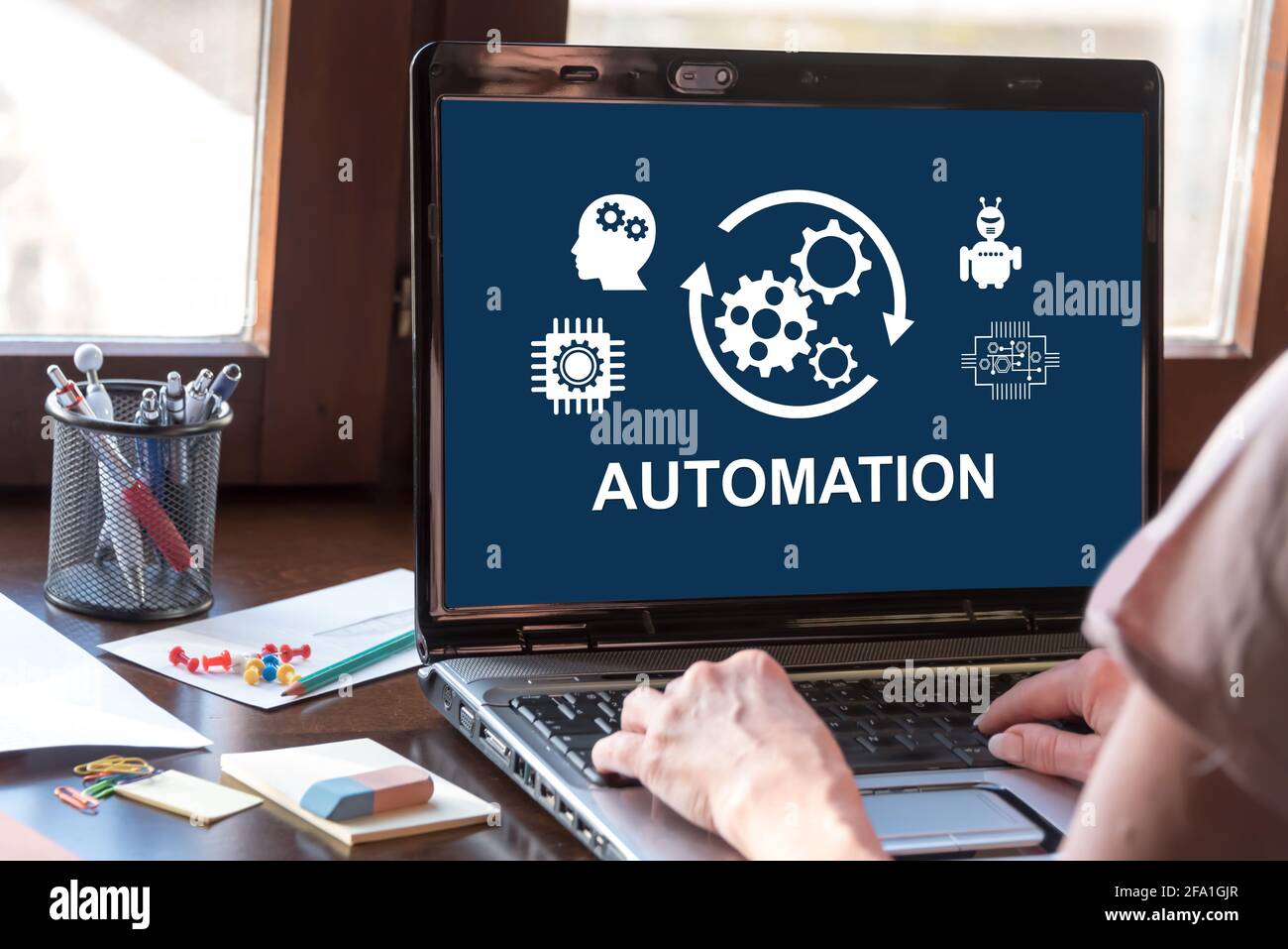 Laptop screen displaying an automation concept Stock Photo - Alamy