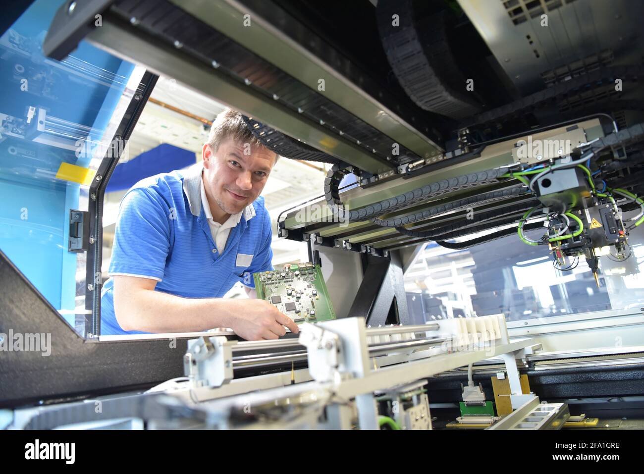 production of electronic components in a modern factory - engineer at ...