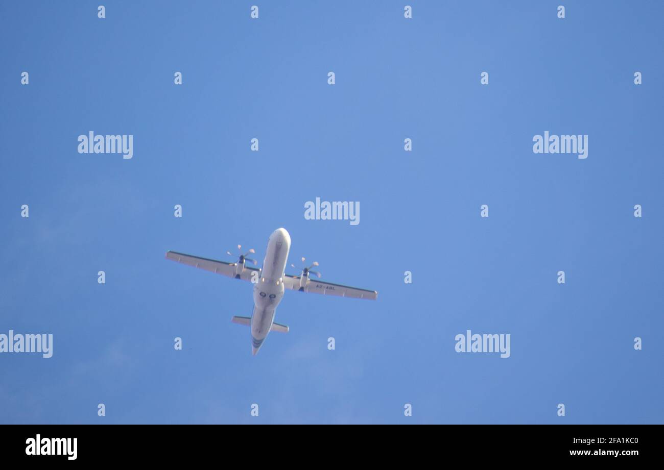 Johannesburg, South Africa - a prop-driven aircraft isolated in the sky ...