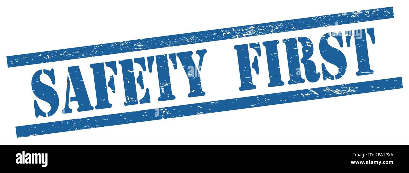 SAFETY FIRST text on blue grungy rectangle vintage stamp Stock Photo ...