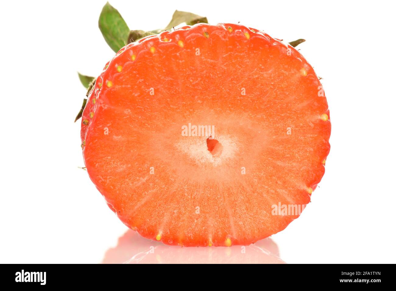 Bright red, ripe half of strawberries, close-up, on a white background ...