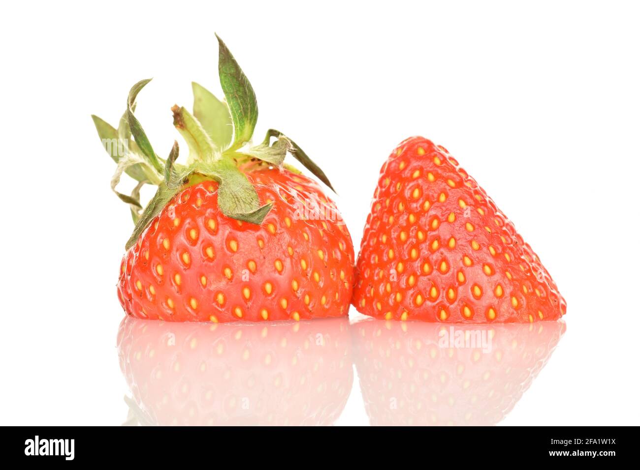 Two halves of strawberries hi-res stock photography and images - Alamy
