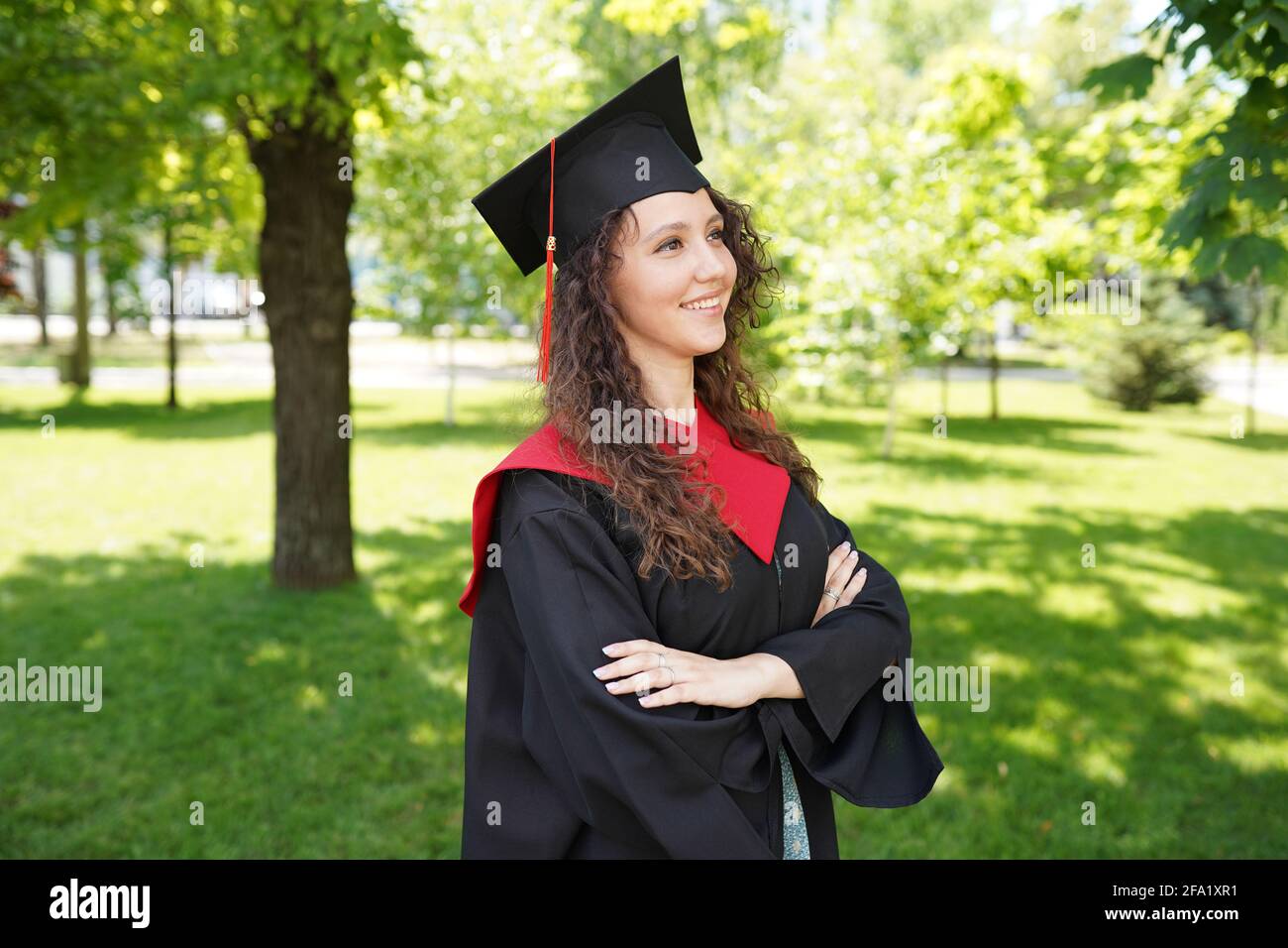 Boy wearing graduation cap gown hi-res stock photography and images - Alamy