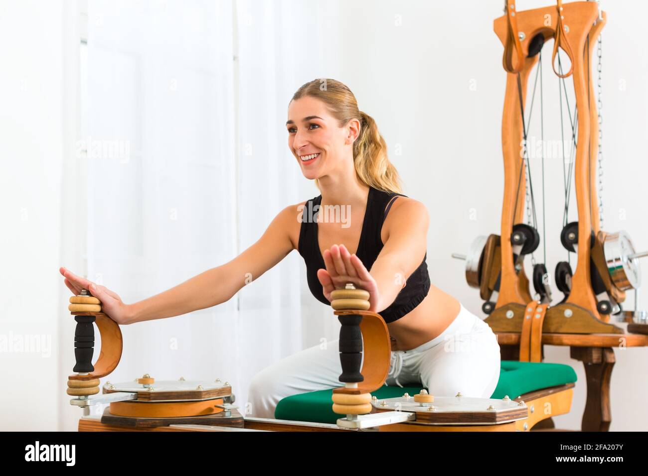 Patient at the physiotherapy making physical exercises Stock Photo - Alamy