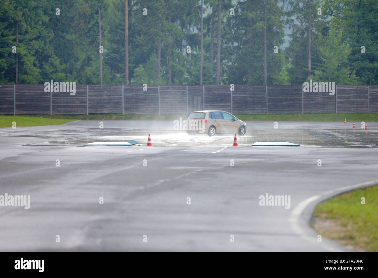 Car driving puddle hi-res stock photography and images - Alamy