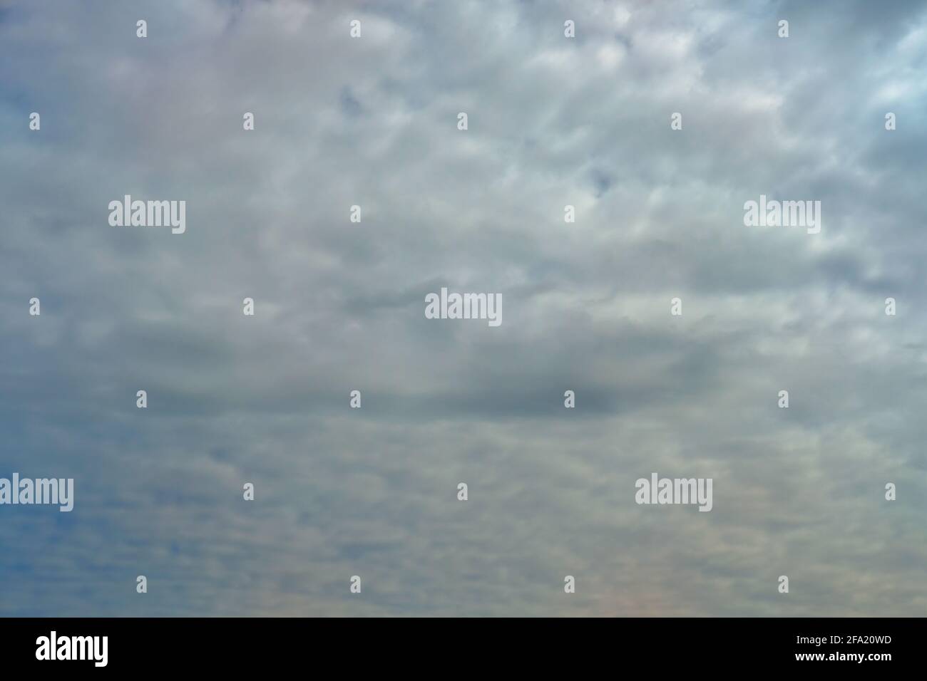 Dramatic real sky with grey clouds before storm. The real sky ...