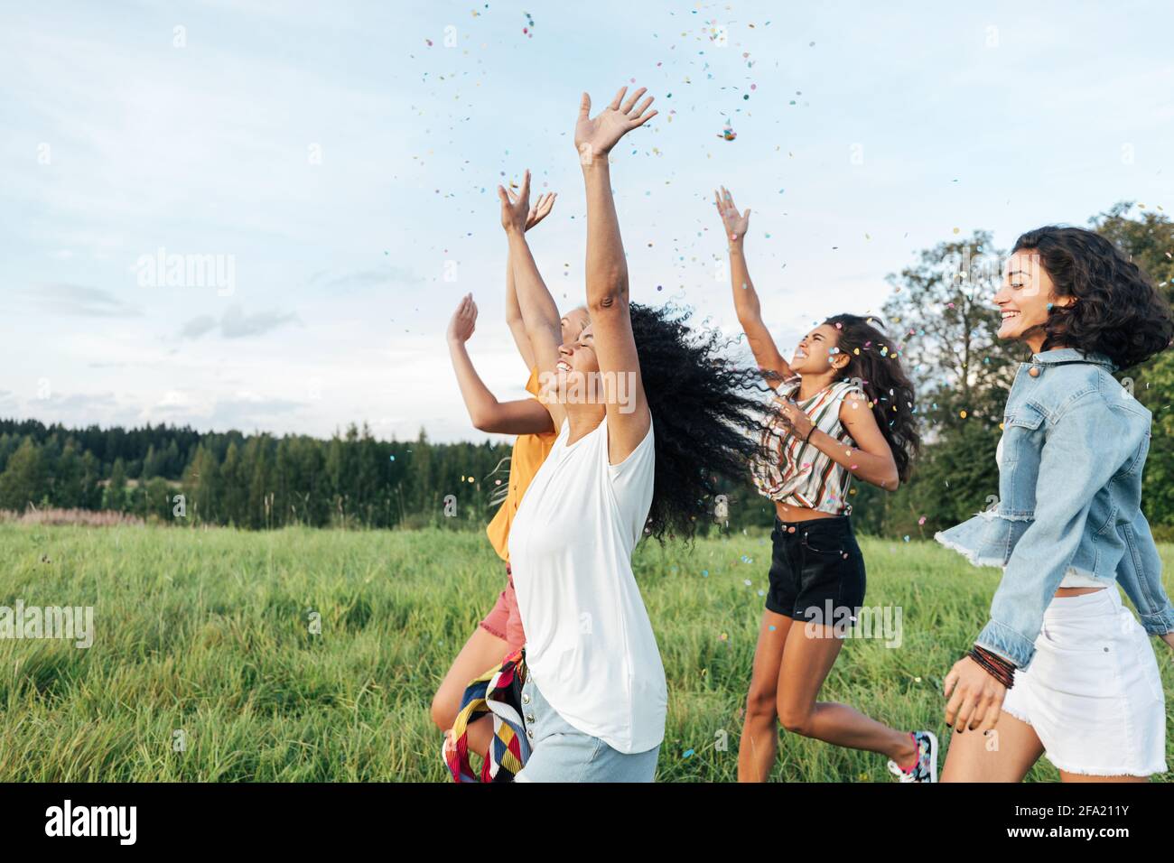 Friends celebrating multi ethnic hi-res stock photography and images - Alamy