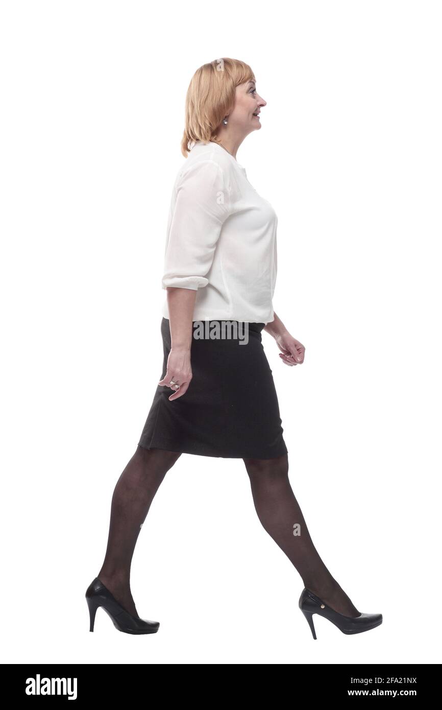 in full growth. smiling business woman striding forward Stock Photo - Alamy