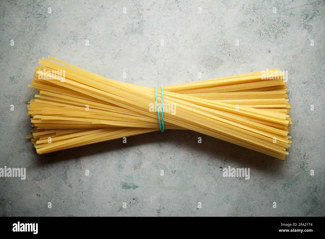 Spaghetti on a stone table Stock Photo - Alamy