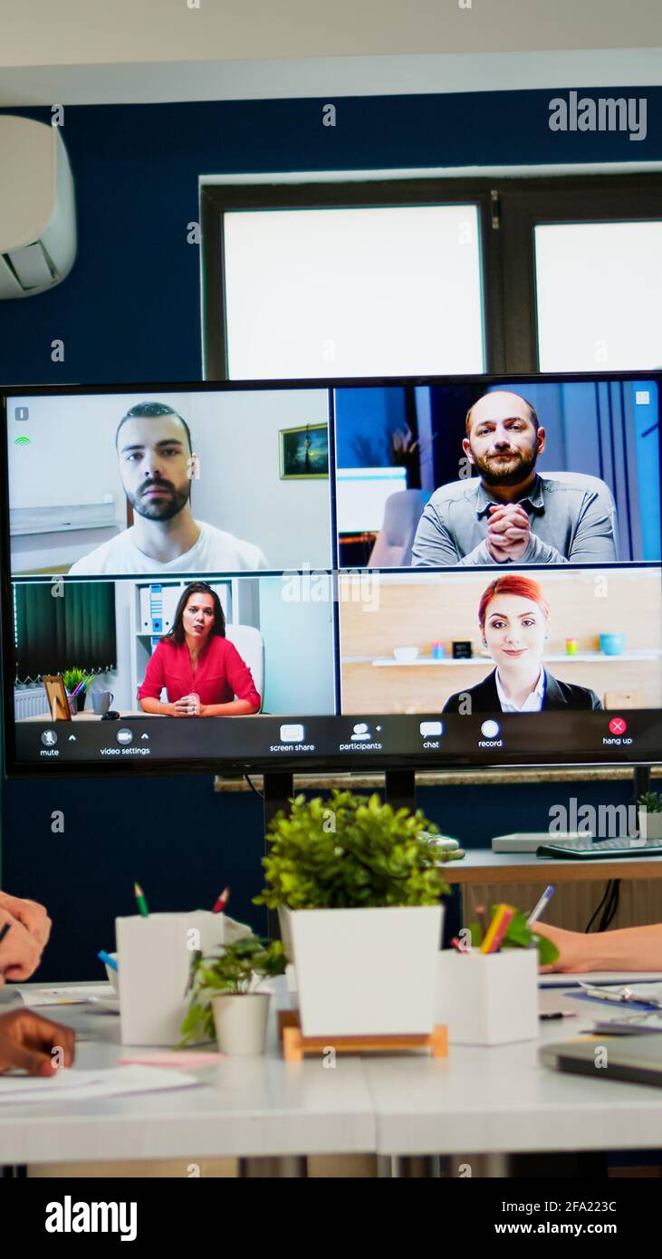 Team working by group video call share ideas brainstorming negotiating ...