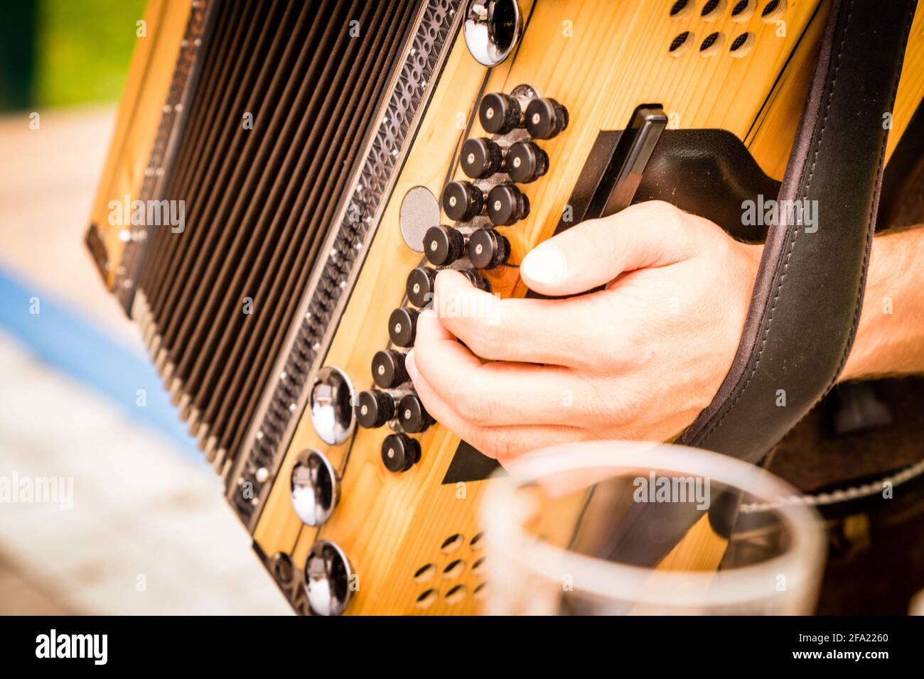 man hand playing accordion Stock Photo - Alamy