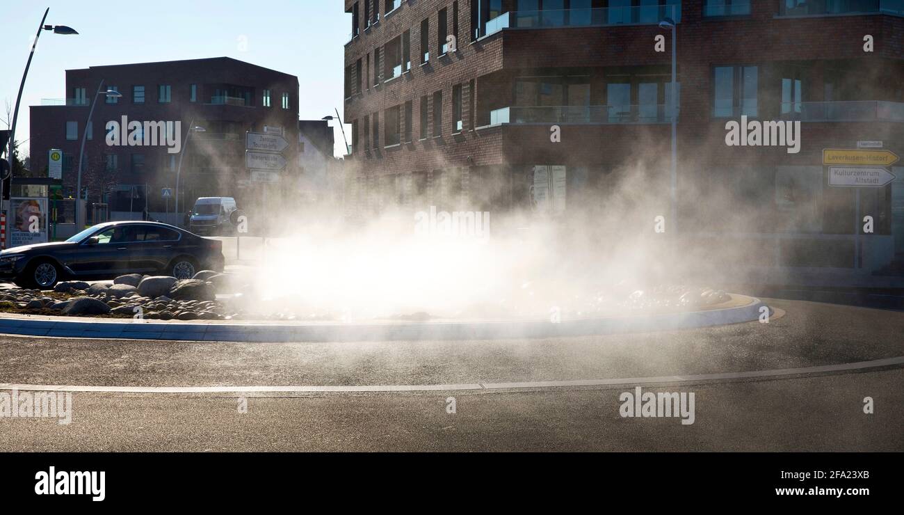 Monheim geyser in the roundabout, Germany, North Rhine-Westphalia ...