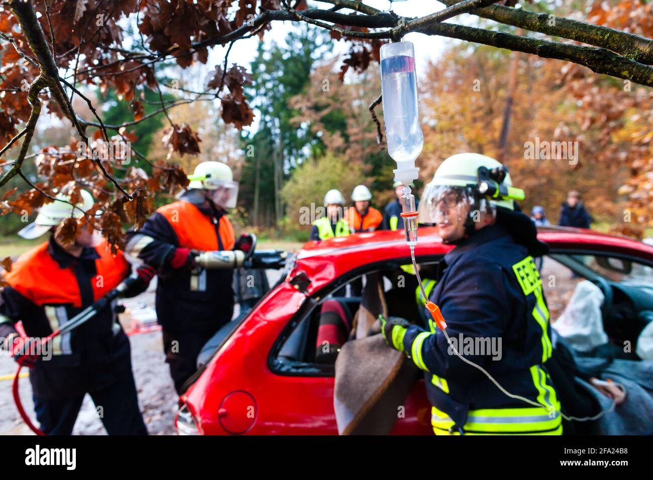 Accident - Fire brigade rescues accident Victim of a car using a ...