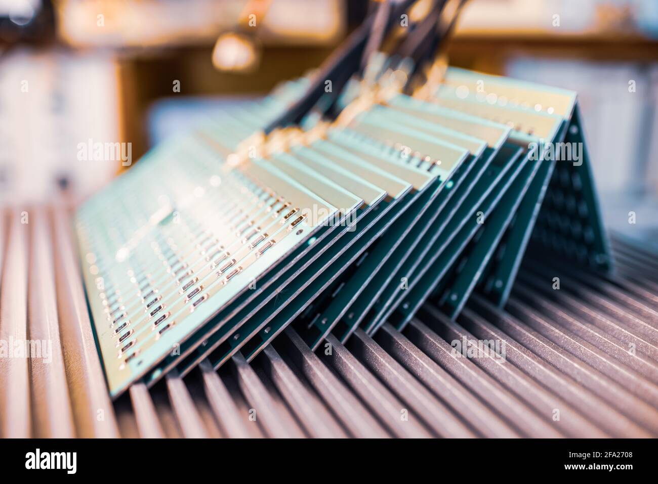 Microcircuits and components lie on metal plates Stock Photo - Alamy
