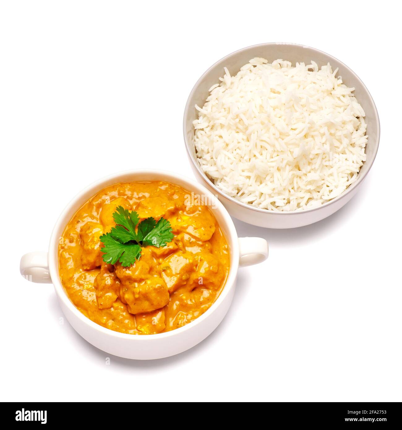 Traditional Chicken Curry and a bowl of boiled rice isolated on white ...