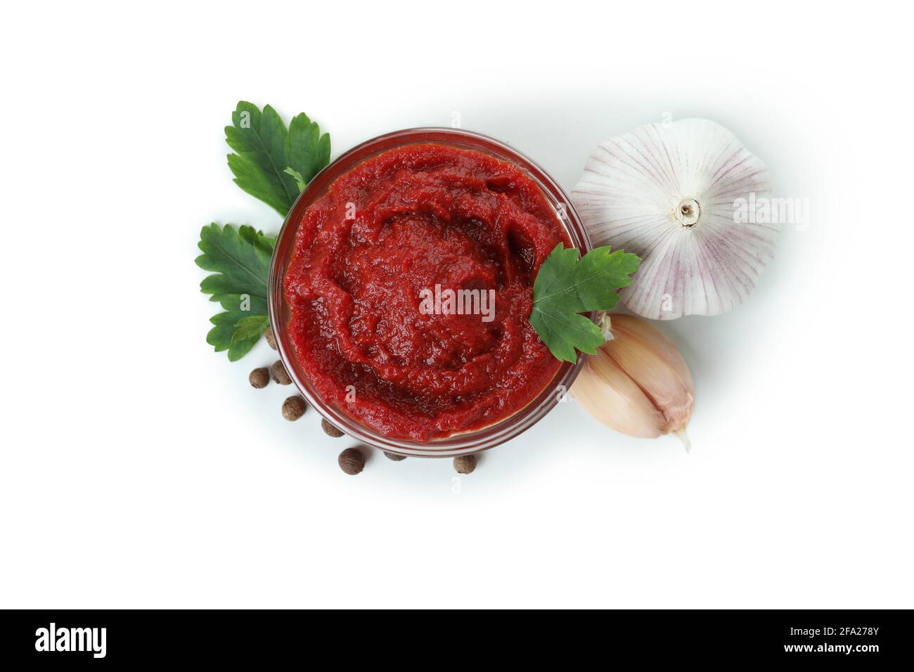 Bowl of tomato paste isolated on white background Stock Photo - Alamy