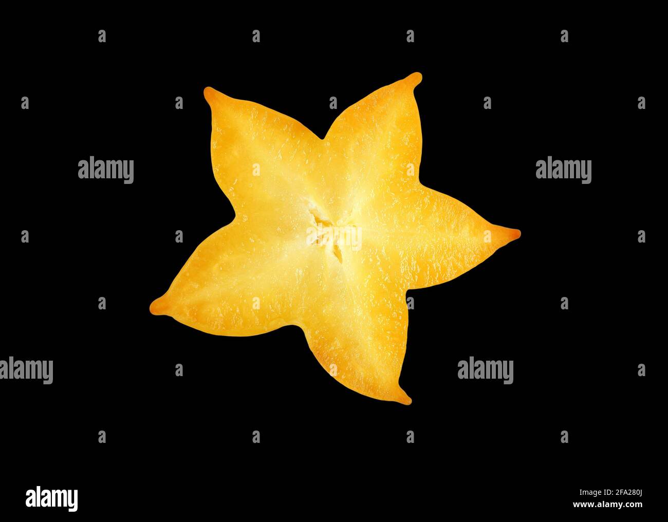 Closeup of fresh ripe star fruit cross section isolated on black ...