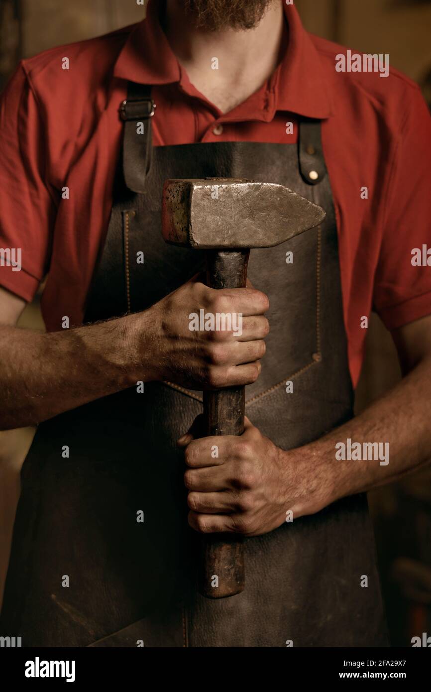 One smith blacksmith man forging hi-res stock photography and images ...