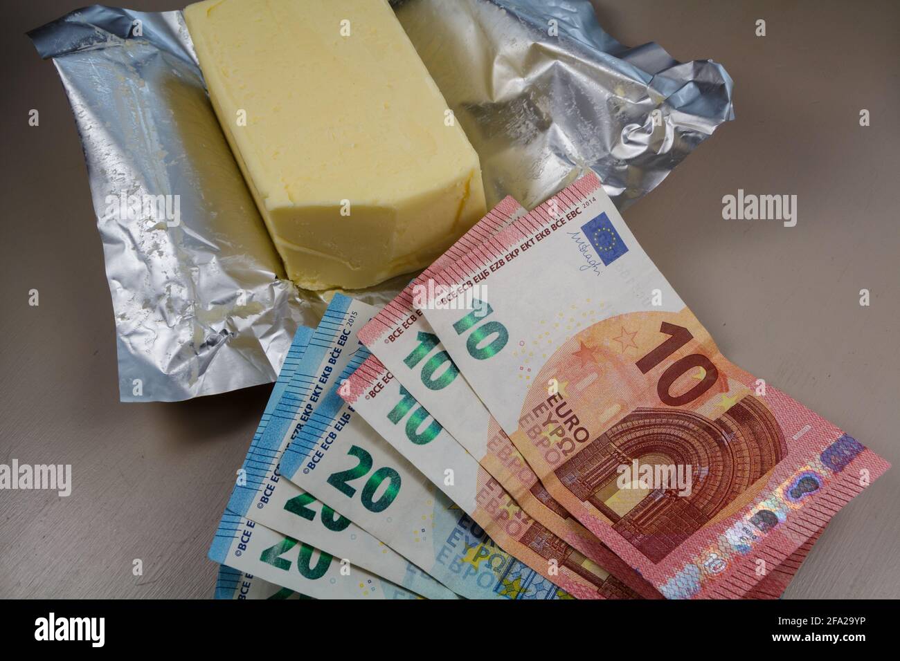 Packs of butter are more and more expensive Stock Photo - Alamy