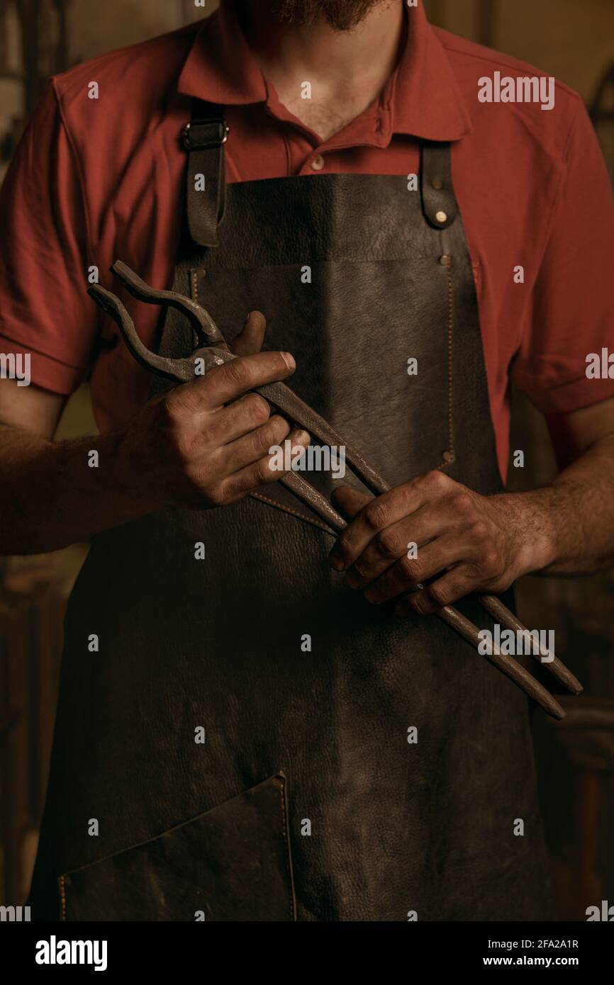 One smith blacksmith man forging hi-res stock photography and images ...