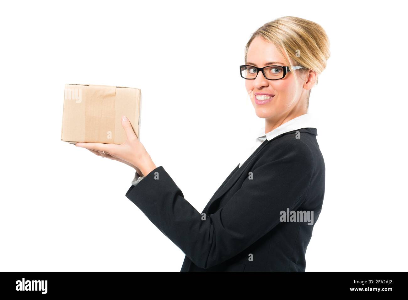 Young woman in front of white background, she ship a package or would ...