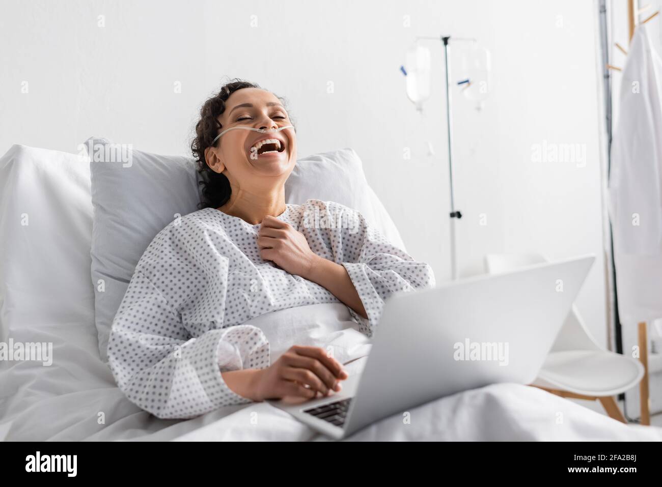 Laughing hospital bed hi-res stock photography and images - Alamy