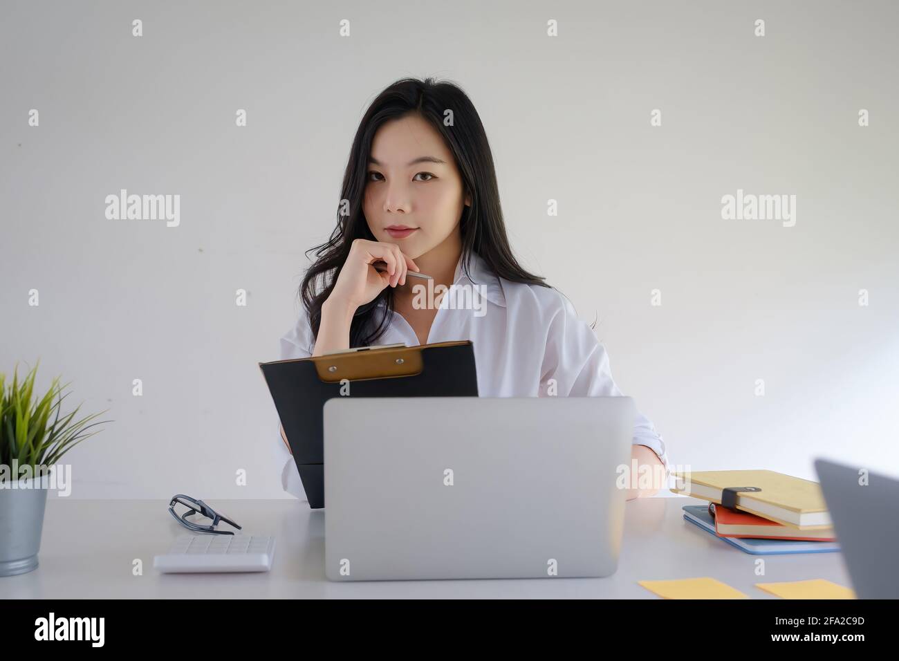 Business woman or accountant making working audit with her team ...