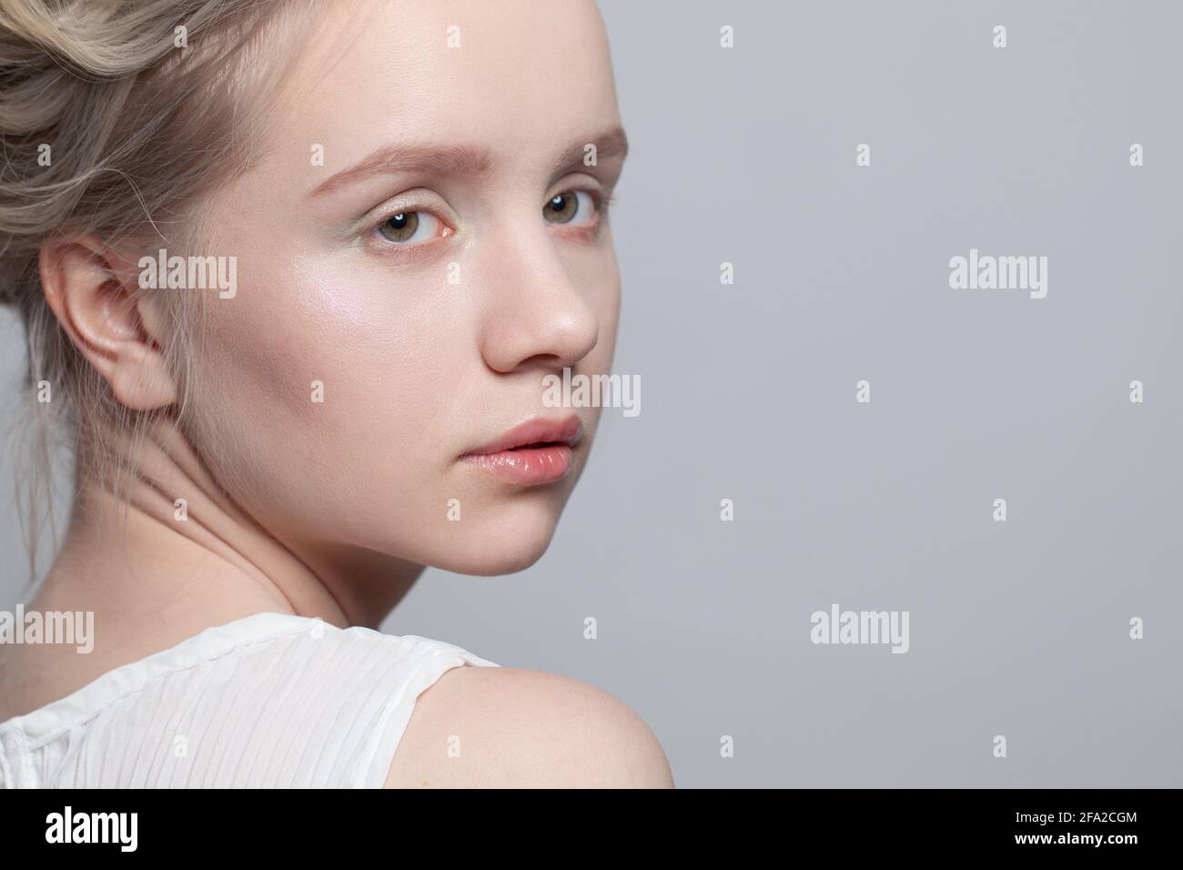 Perfect young woman face close up. Female model on white background ...