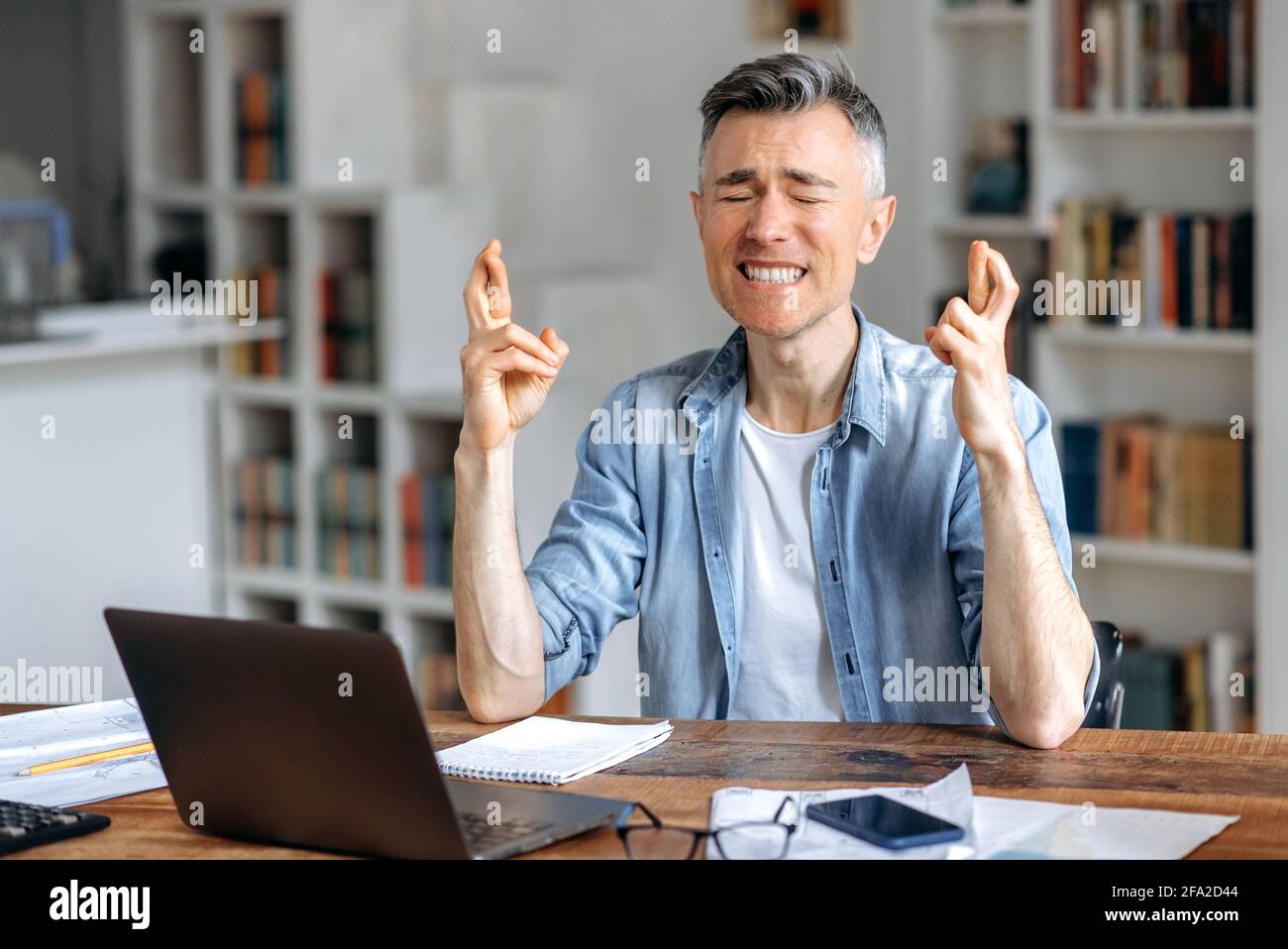 Person praying hi-res stock photography and images - Alamy