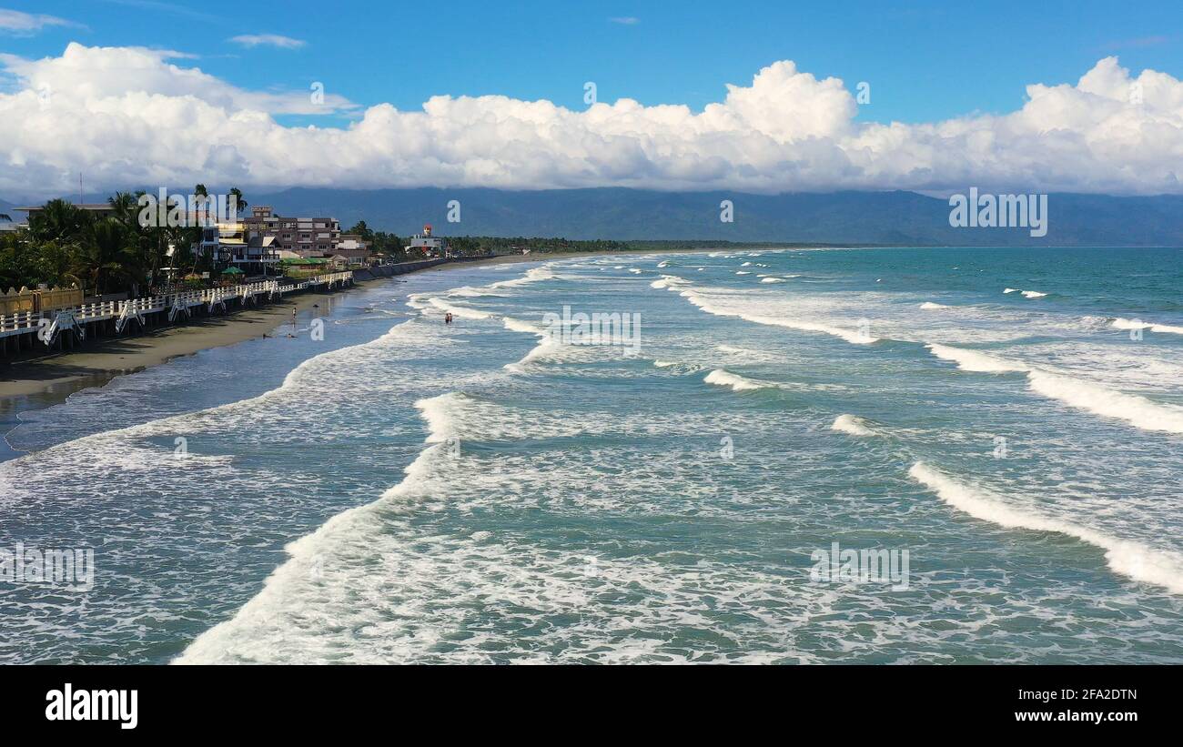 The coast with hotels and tourists, a famous place for surfing in the ...