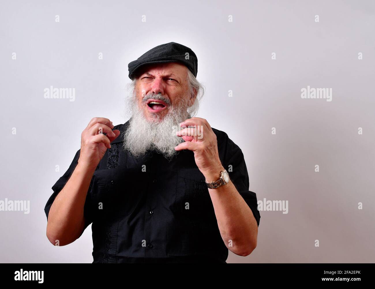 Grumpy senior man in an argument Stock Photo - Alamy