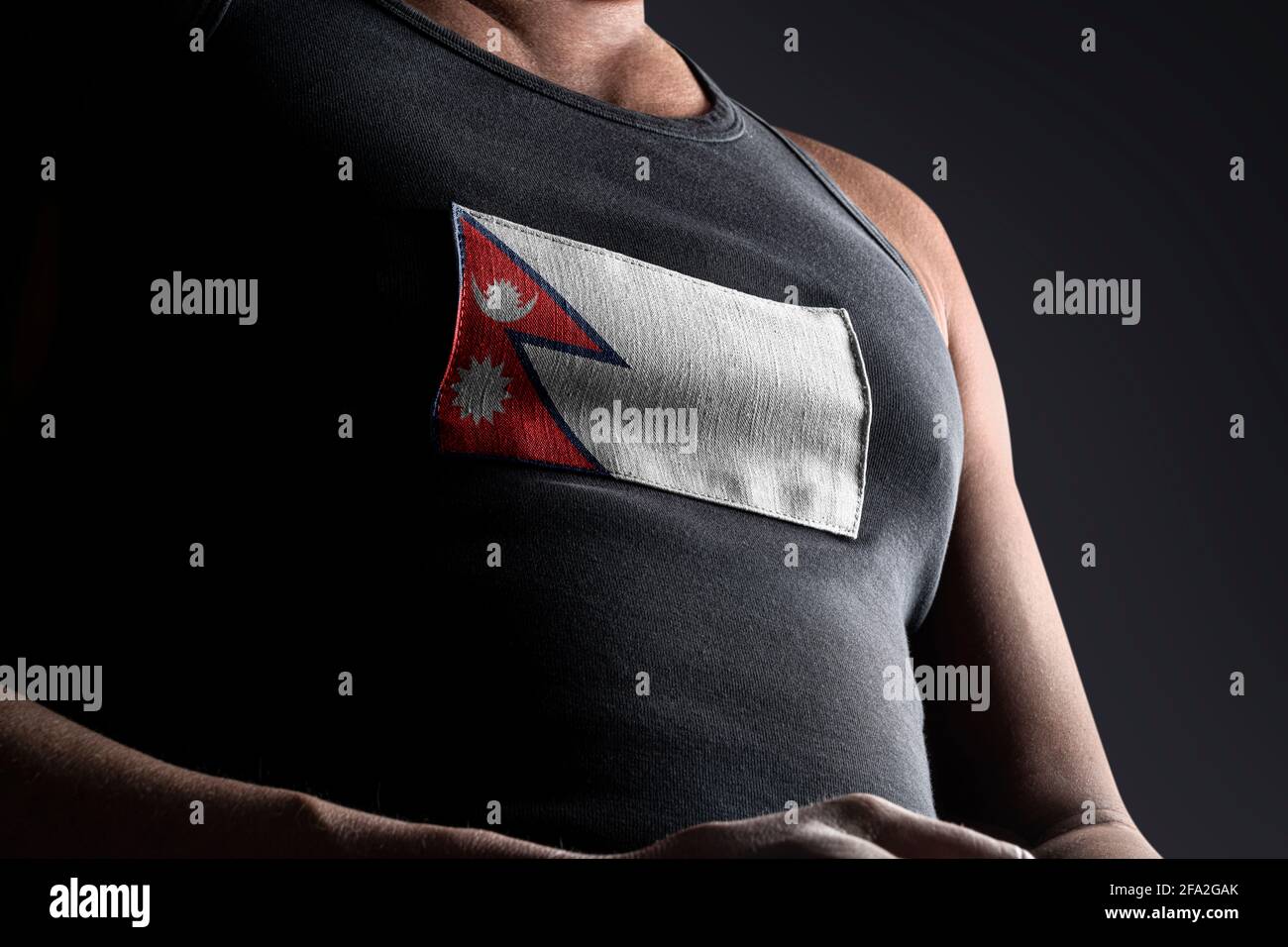 The national flag of Nepal on the athlete's chest Stock Photo - Alamy