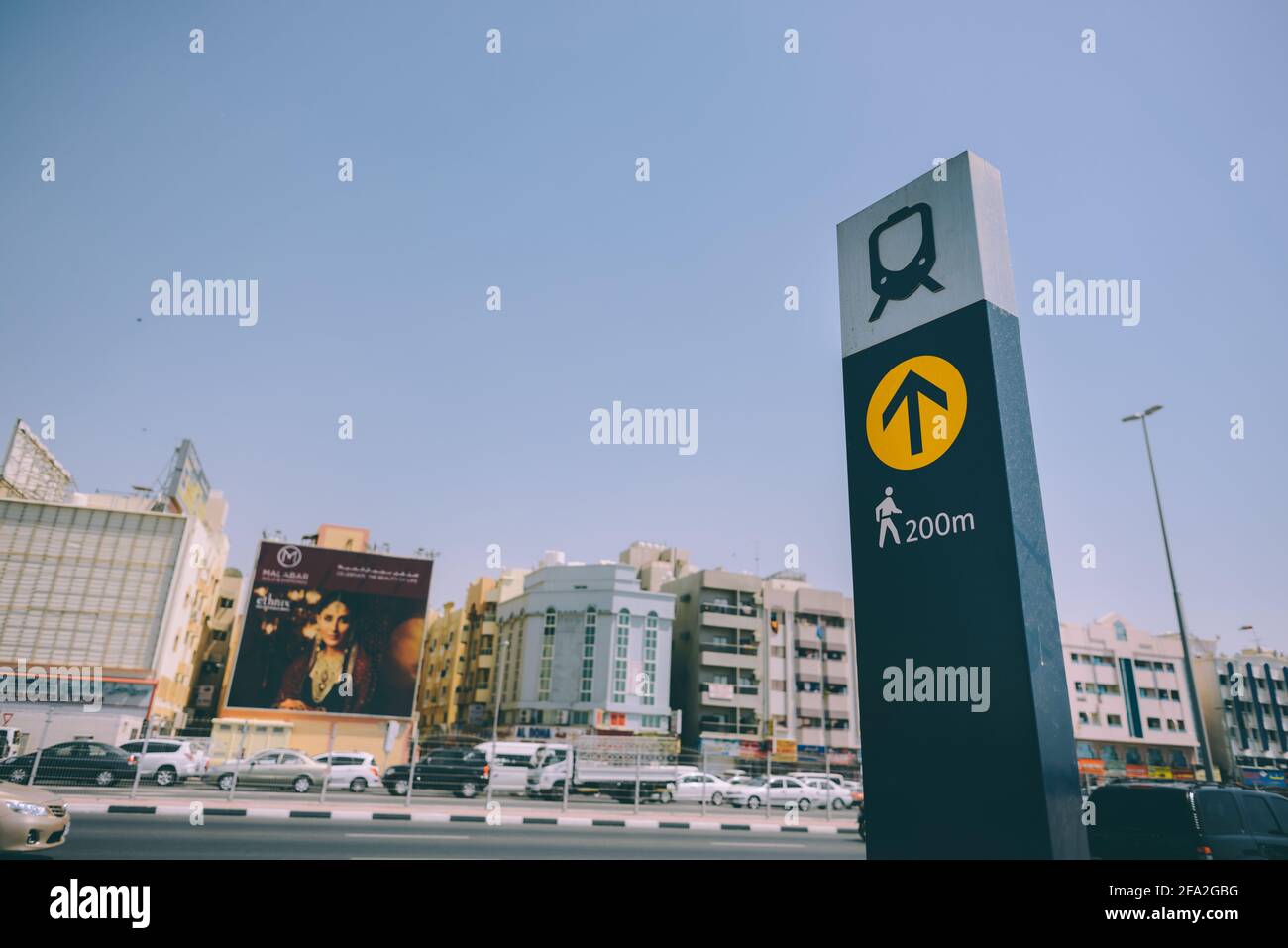 Dubai, UAE - May 26, 2013. Metro sign in Deira district in the city of ...