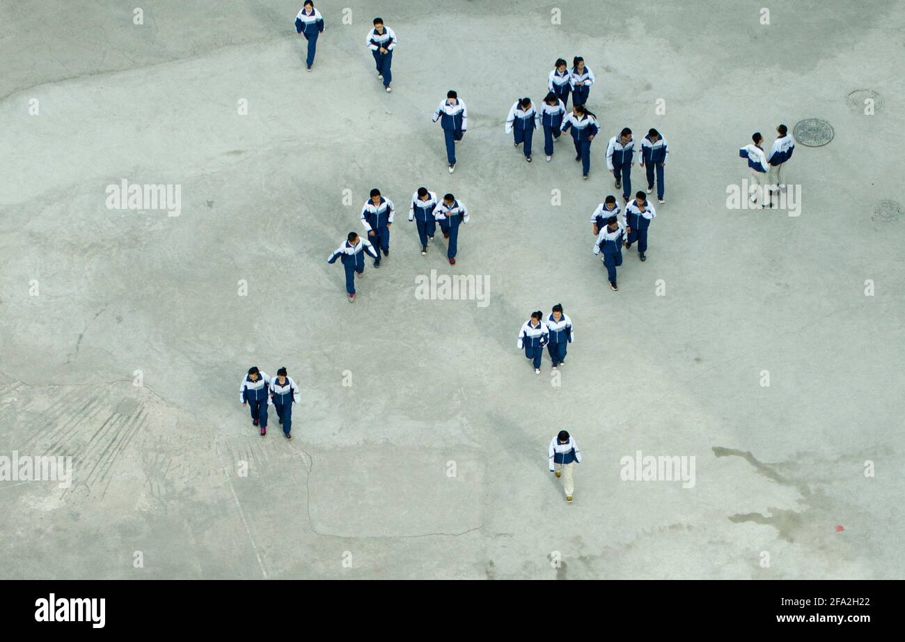 Han Chinese students of the No 11 Middle School in their blue and white ...