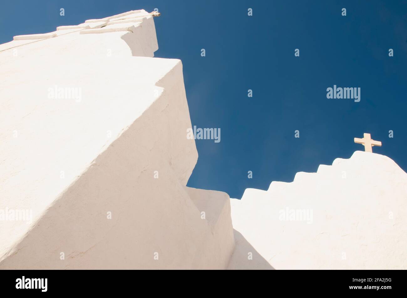 Geometric perspective view of two white-walled churches on the island ...